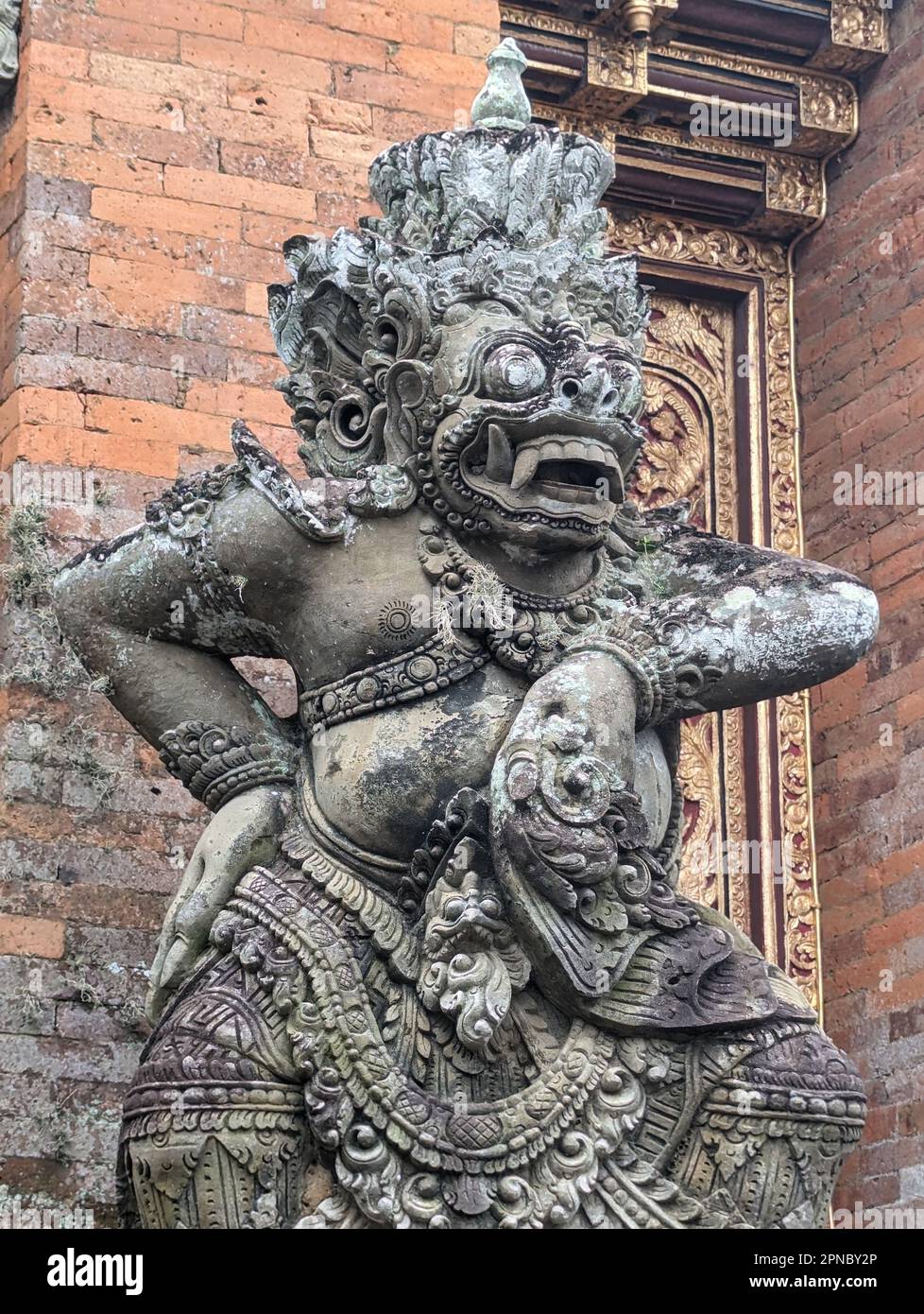 An ancient statue depicting a demonic figure Stock Photo - Alamy