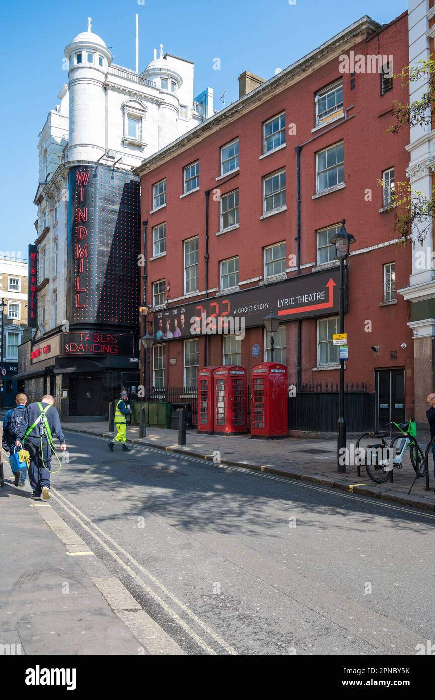 View along Great Windmill Street towards the Windmill Soho Nightclub, a ...