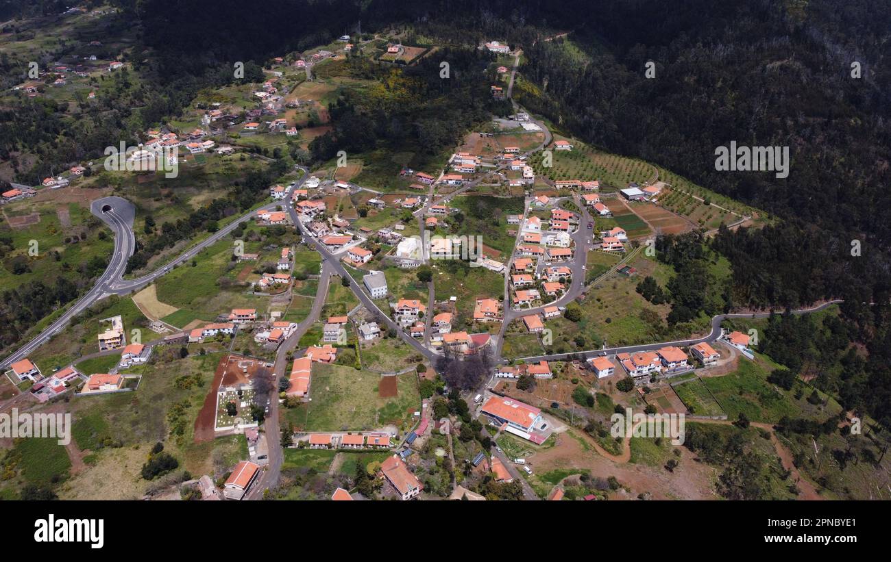 Aerial view of a bustling cityscape with lush green parks interspersed ...