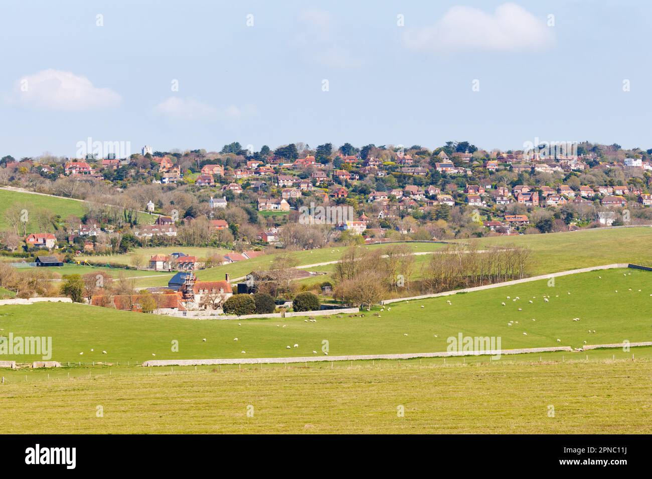 The village of East Dean on the South Downs near Eastbourne, Sussex, UK ...