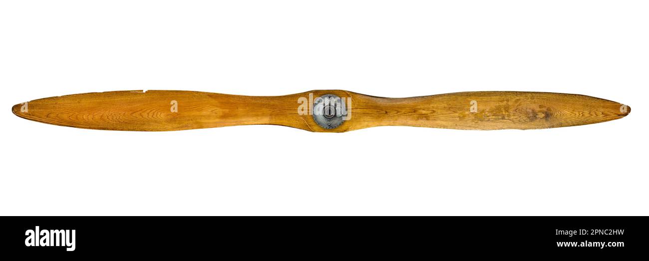 Ancient weathered wooden airplane propeller isolated on a white ...