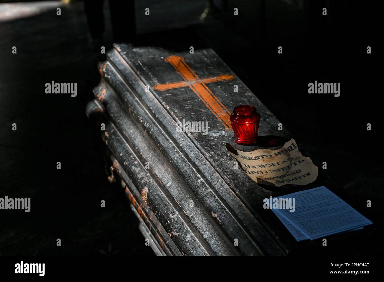 LVIV, UKRAINE - APRIL 15, 2023 - A vigil lantern glows on a 17th ...