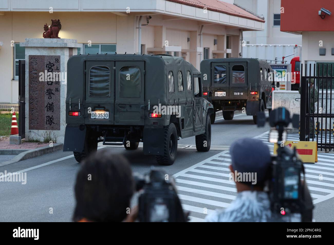 Vehicles of the Japan Ground Self-Defense Force (JGSDF) carrying the ...