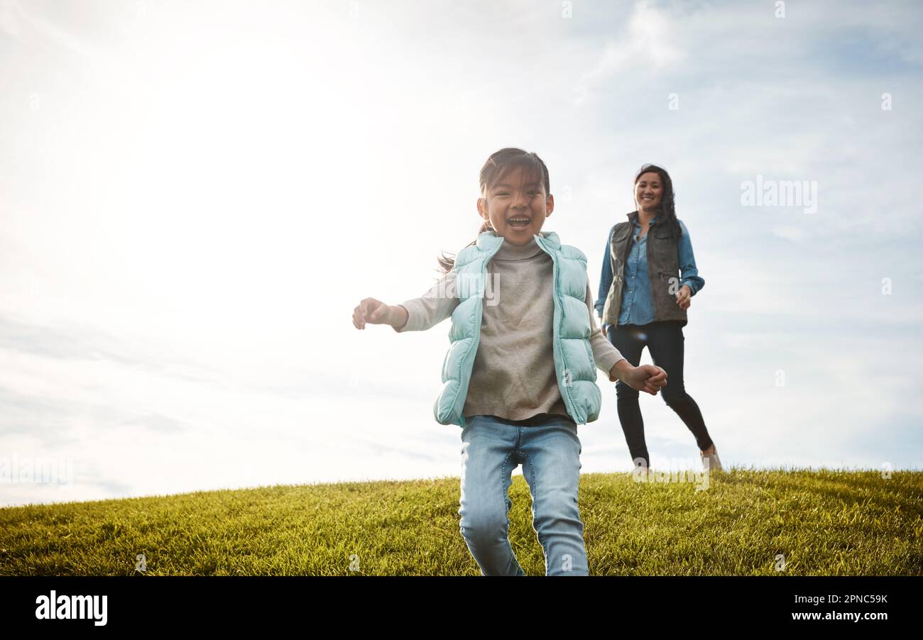 Let your child take the lead in play. an adorable little girl out for a ...