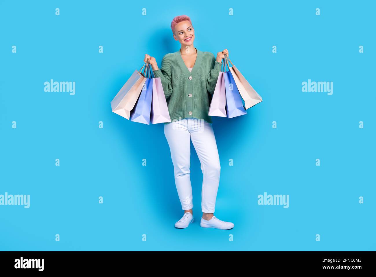 Full body photo of young model girl pink hair hold bargains shopping ...
