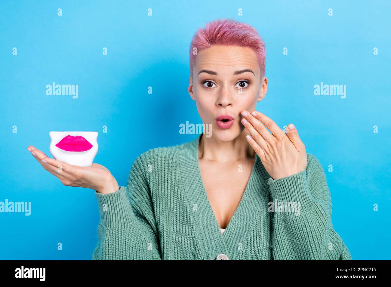 Portrait of astonished impressed lady arm hold facial lips shocked big ...