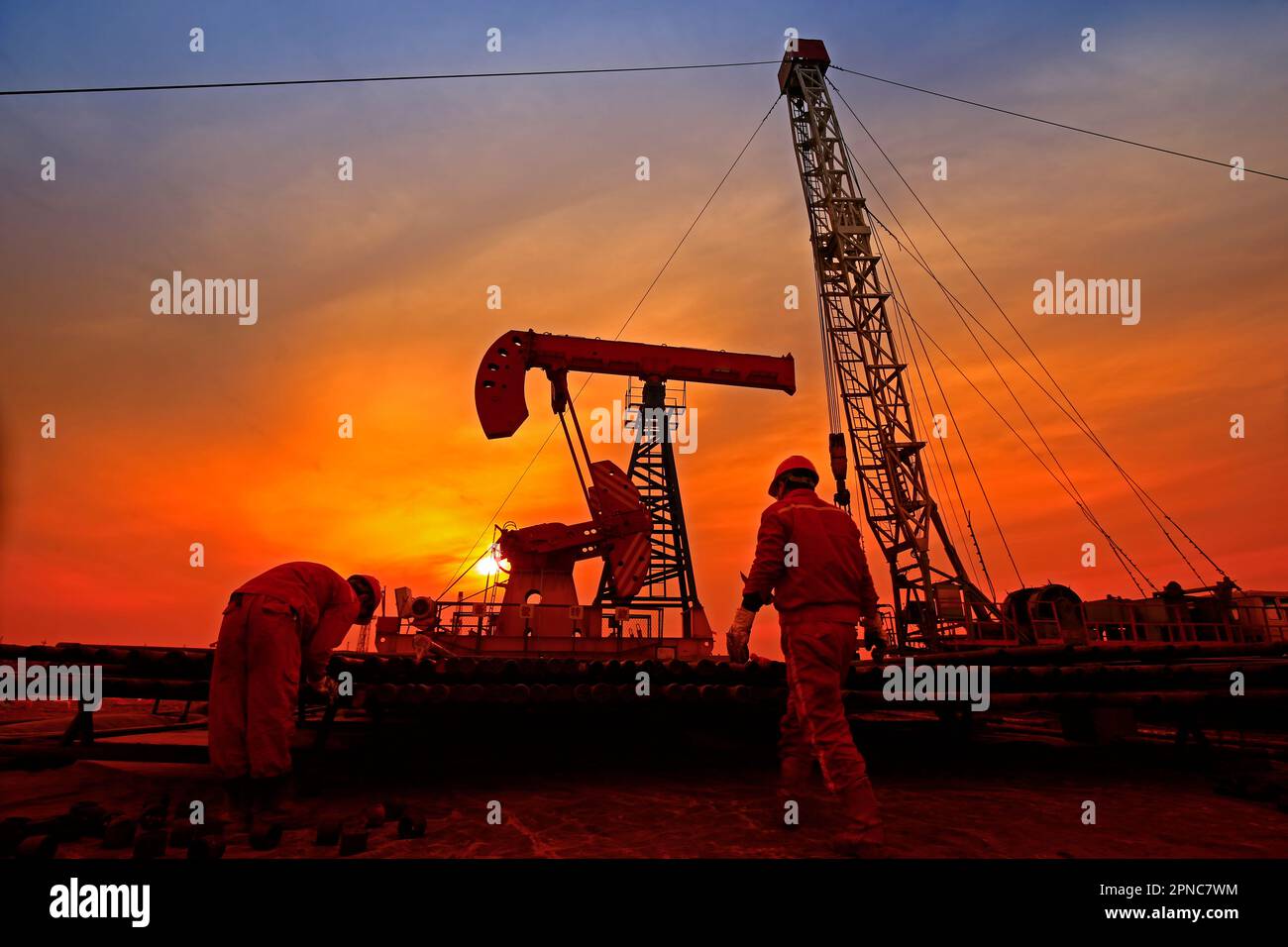 the oil workers are working Stock Photo - Alamy