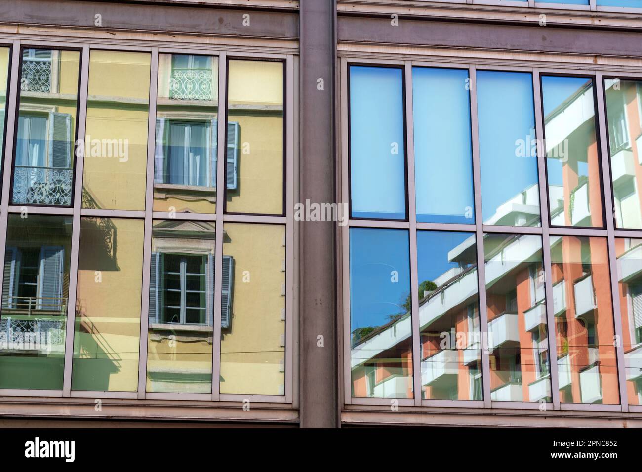 Windows in Milan, Lombardy, Italy, along via San Marco. Reflections ...