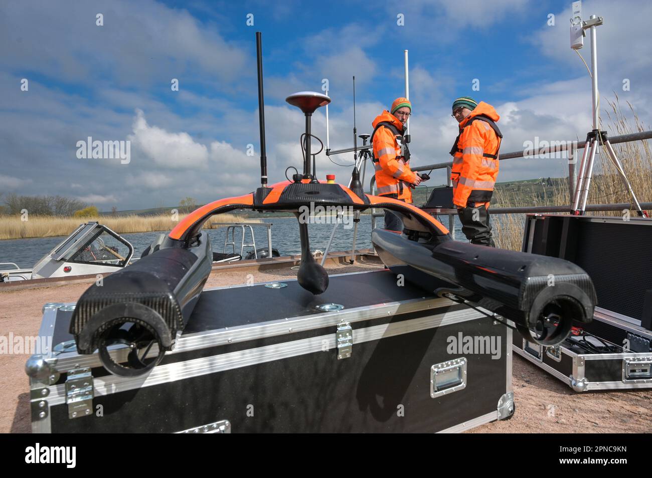 Aseleben, Germany. 18th Apr, 2023. A Sonobot swimming drone stands on a ...