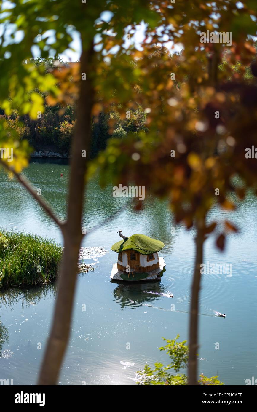 A beautiful scenery of small house in a lake in Golden park (Zlaten ...