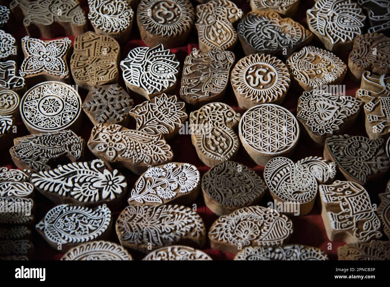 Wooden blocks for the printing on the fabric, displayed in the market ...
