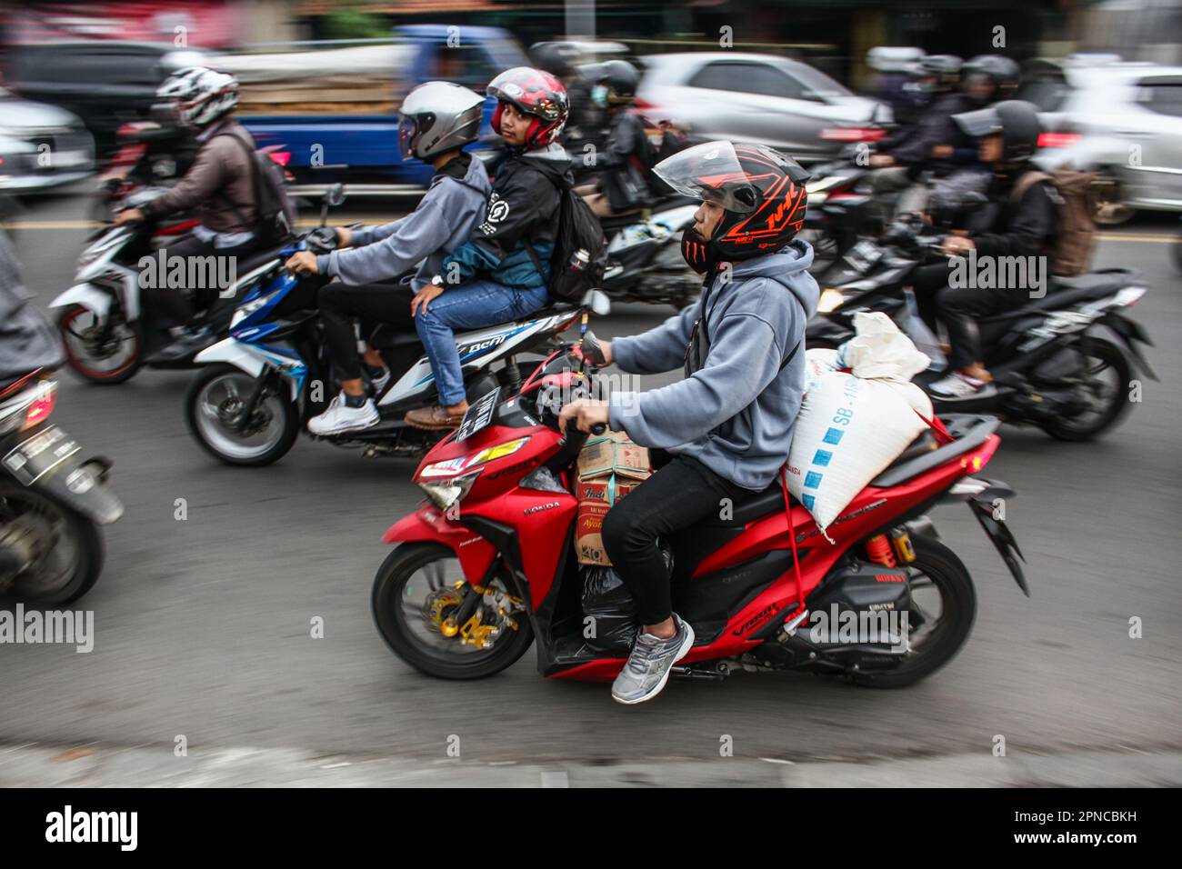 Bandung, West Java, Indonesia. 18th Apr, 2023. Vechiles stuck in a ...