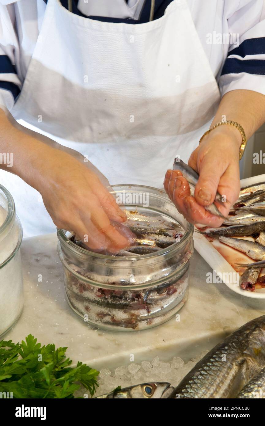 Salting of anchovies at Pescheria Clelia fish market, via Colombo 106 ...
