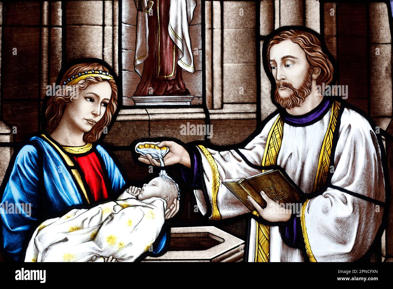 Song Vinh Church. Stained glass. Baptism of a child by affusion ...