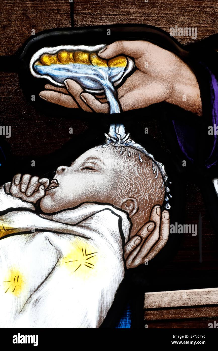 Song Vinh Church. Stained glass. Baptism of a child by affusion ...