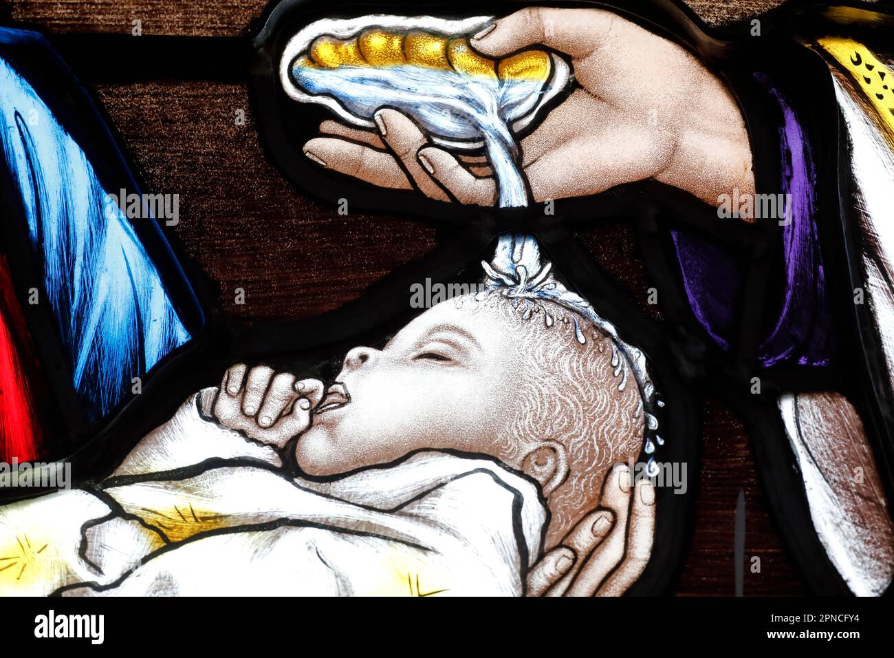 Song Vinh Church. Stained glass. Baptism of a child by affusion ...