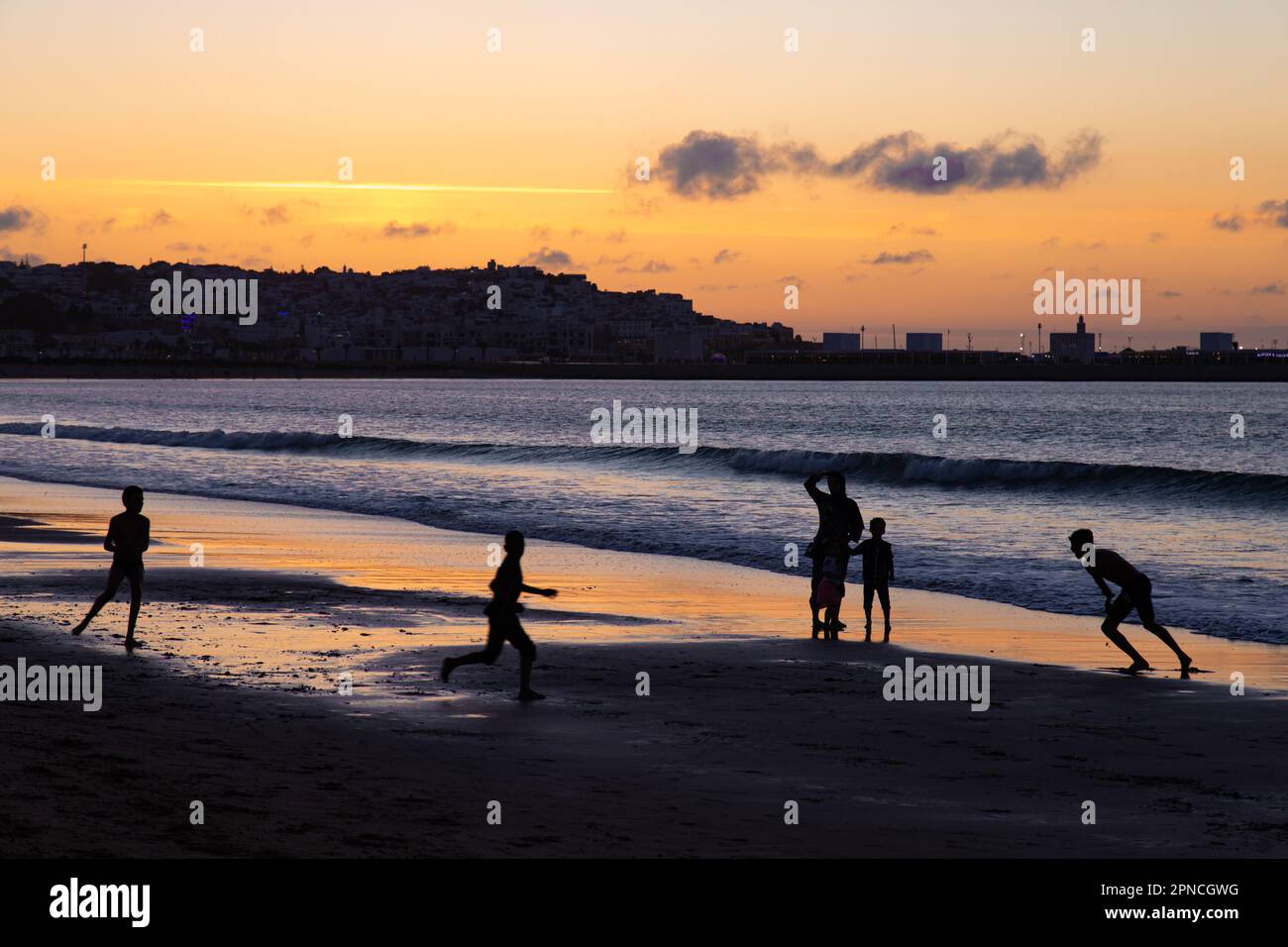 Tangier, Morocco 2022: kids silhouette in a scenic sunset in the ...