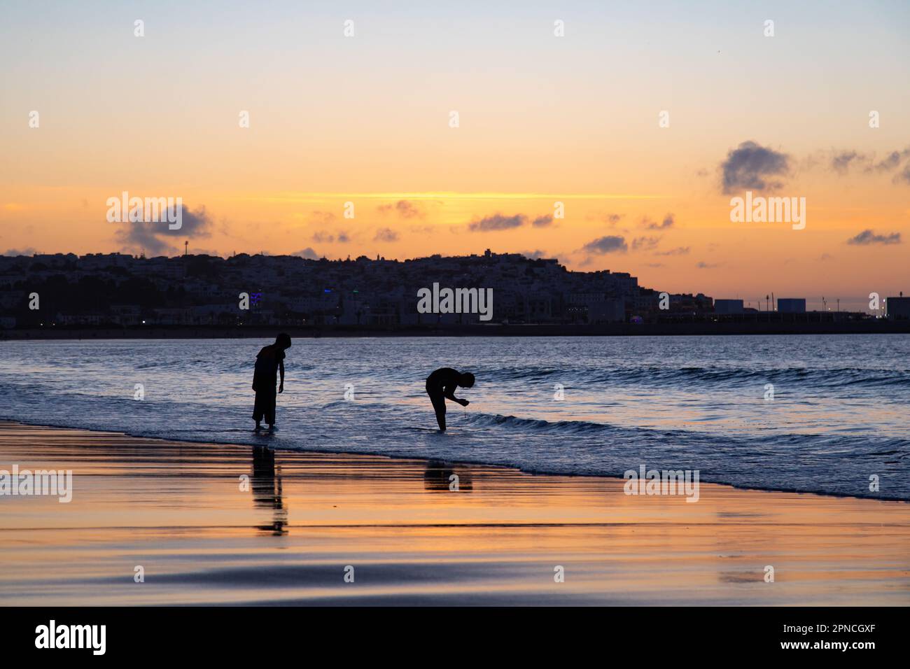 Tangier, Morocco 2022: kids silhouette in a scenic sunset in the ...
