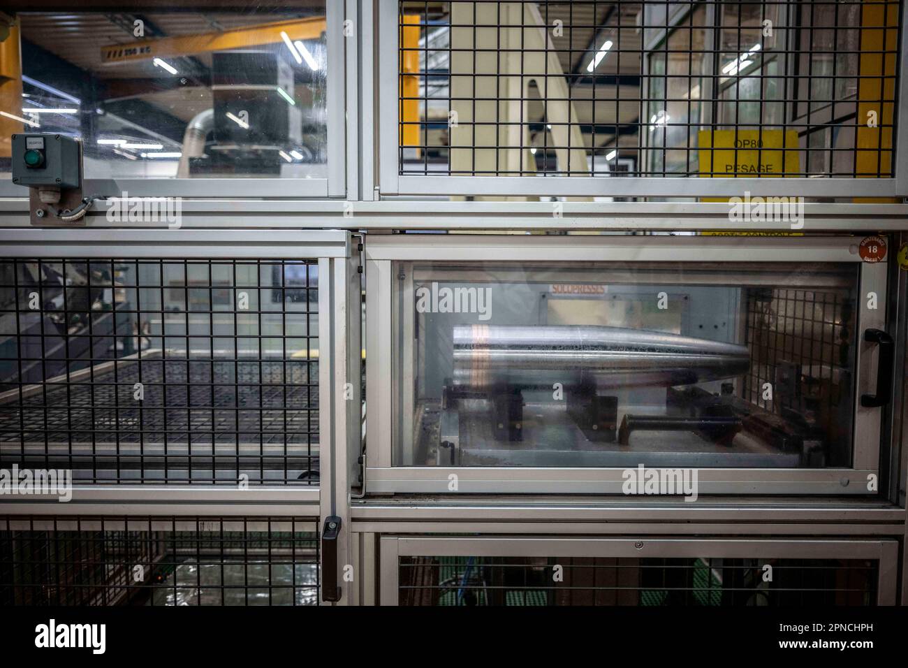 This photograph shows a 155 shell for Cesar gun being manufactured ...