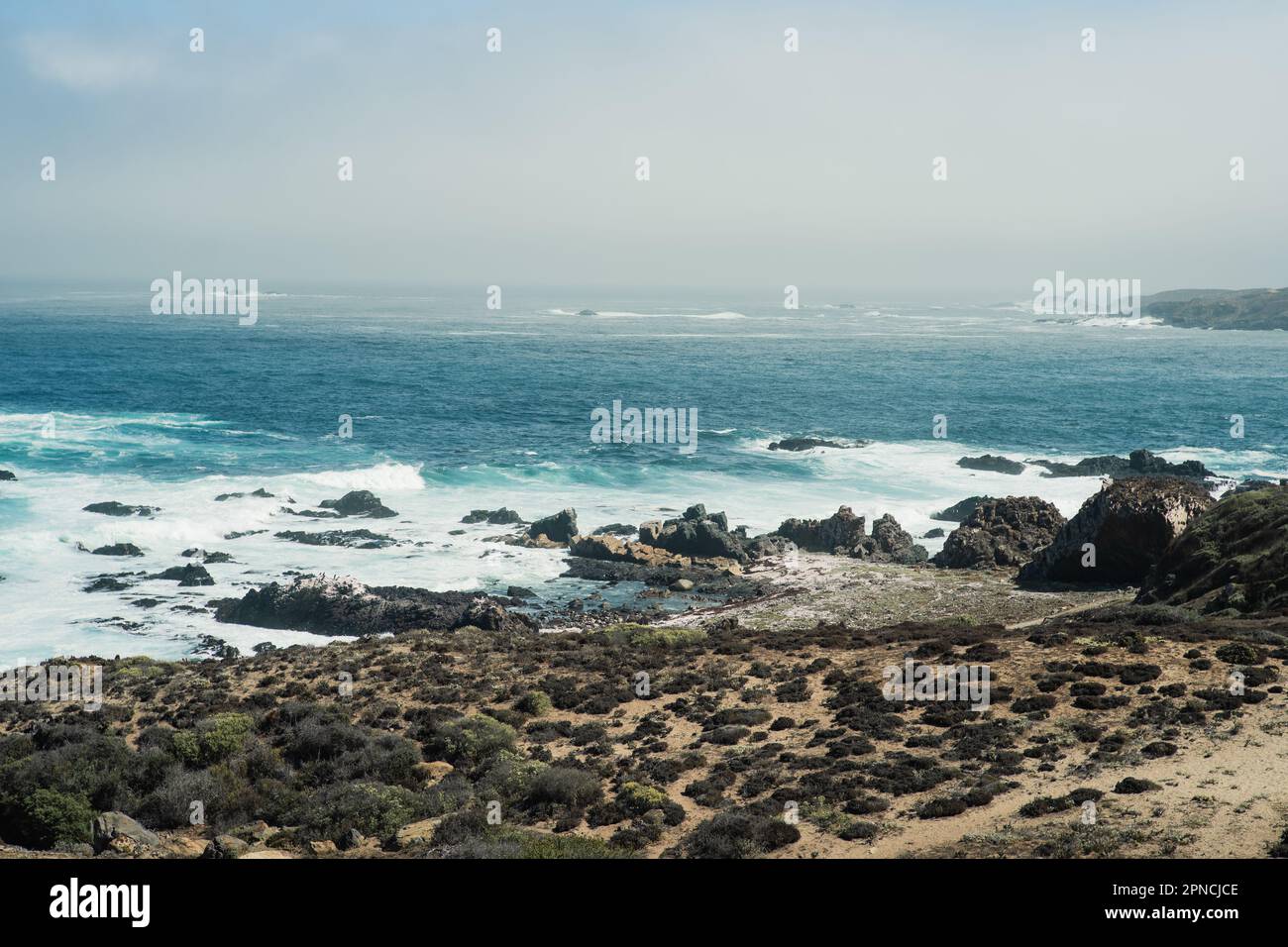 The coastal rocks and blue sea in Los Vilos, Chile Stock Photo - Alamy