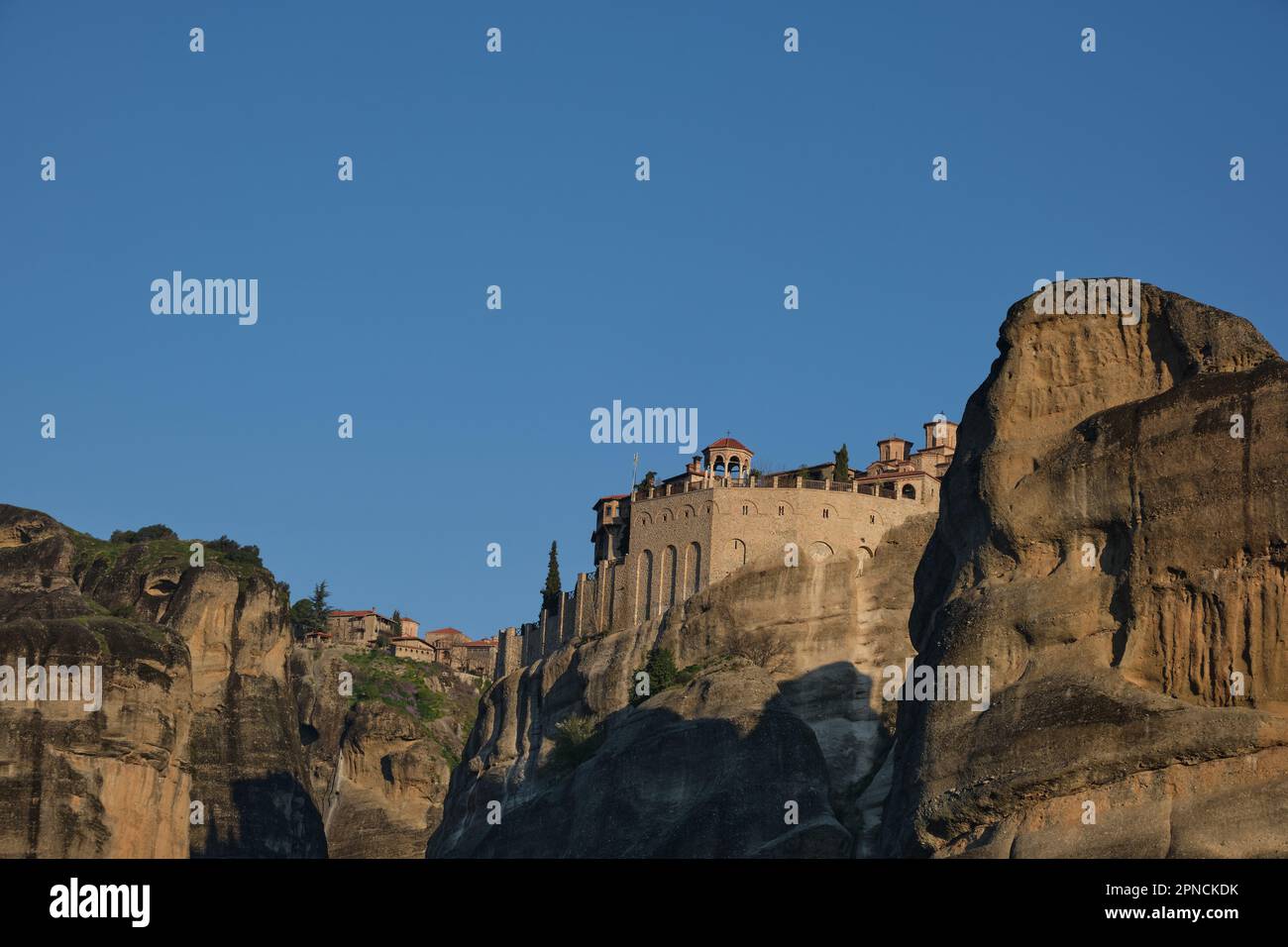 View of the Monastery of Great Meteoron at sunrise in Spring, Meteora ...