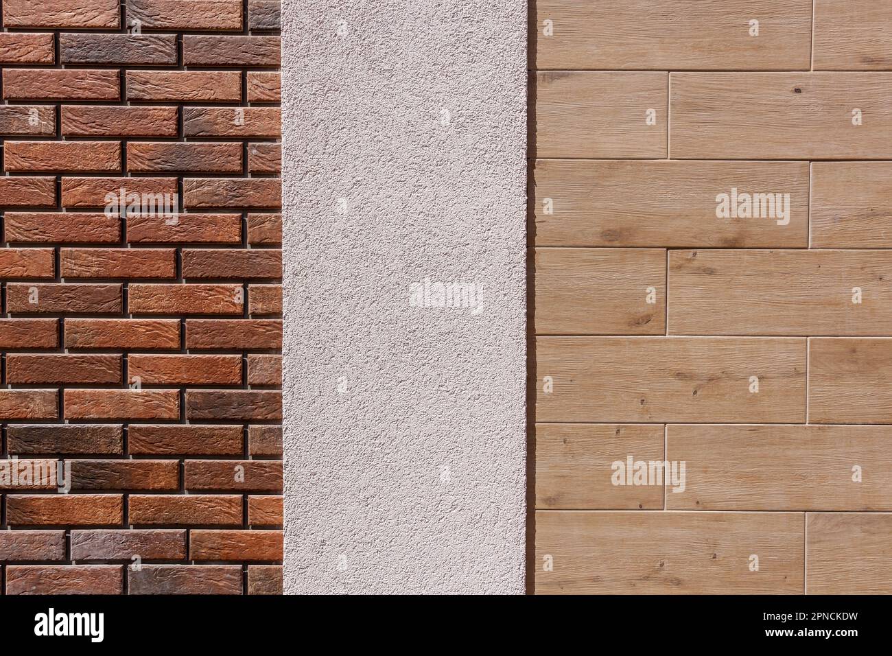 Different textures of the exterior decoration of the walls of the house ...