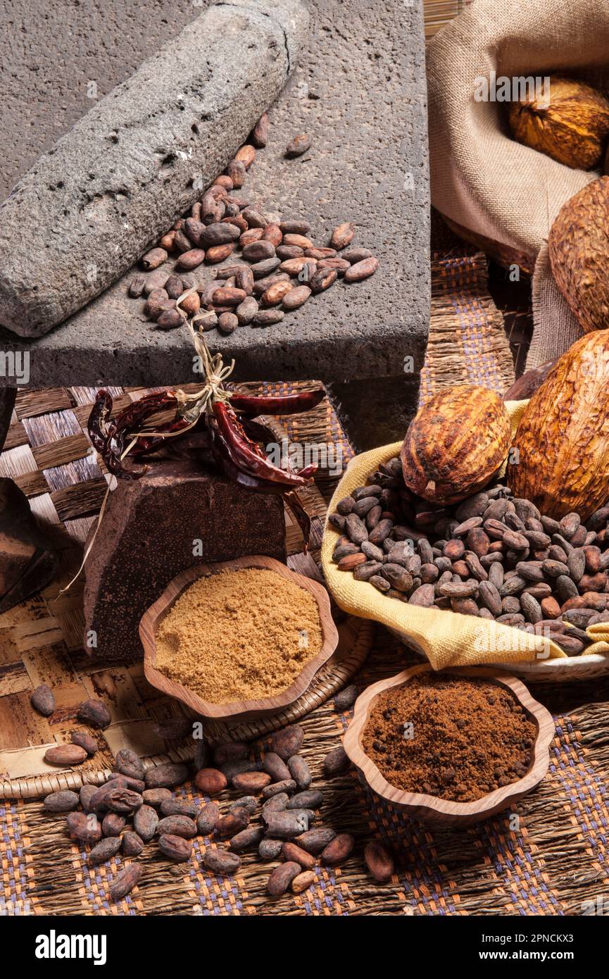 A still life with an ancient stone Metate (A flat stone with a slightly ...