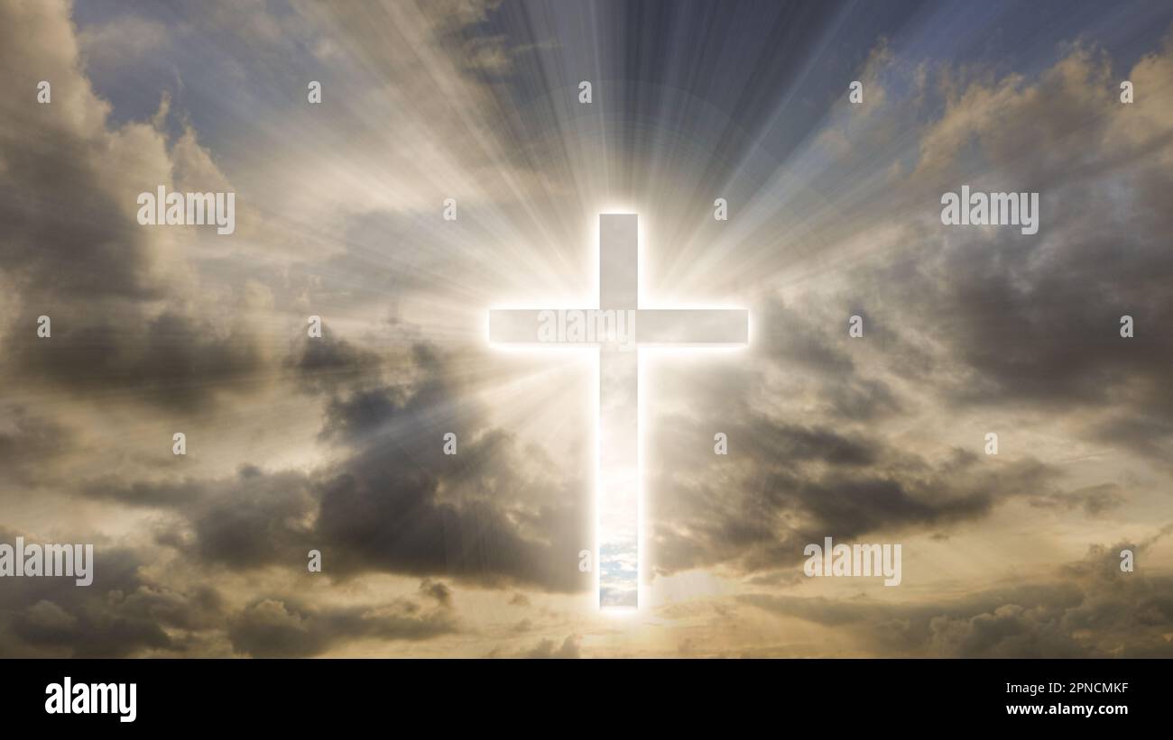 Cross of Jesus Christ in the sky with rays of light shining through ...
