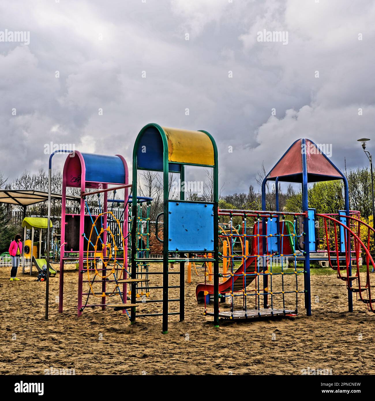 A bright and inviting outdoor play area with colorful playground ...