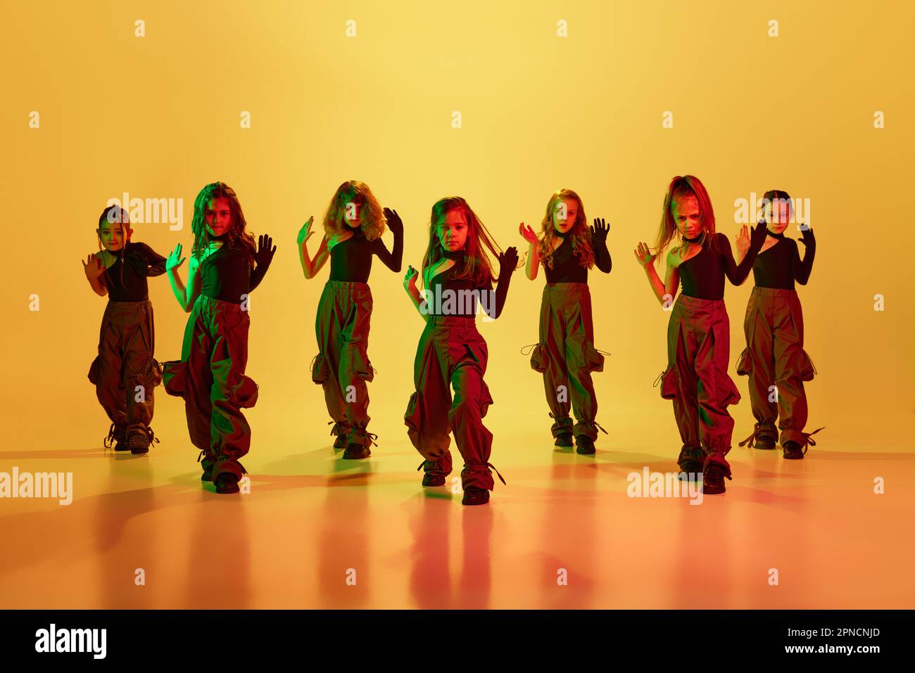 Group of children, little girls in sportive casual style clothes ...