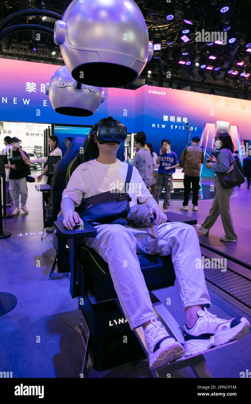 Shanghai, China. 18th Apr, 2023. A visitor experiences VR driving ...