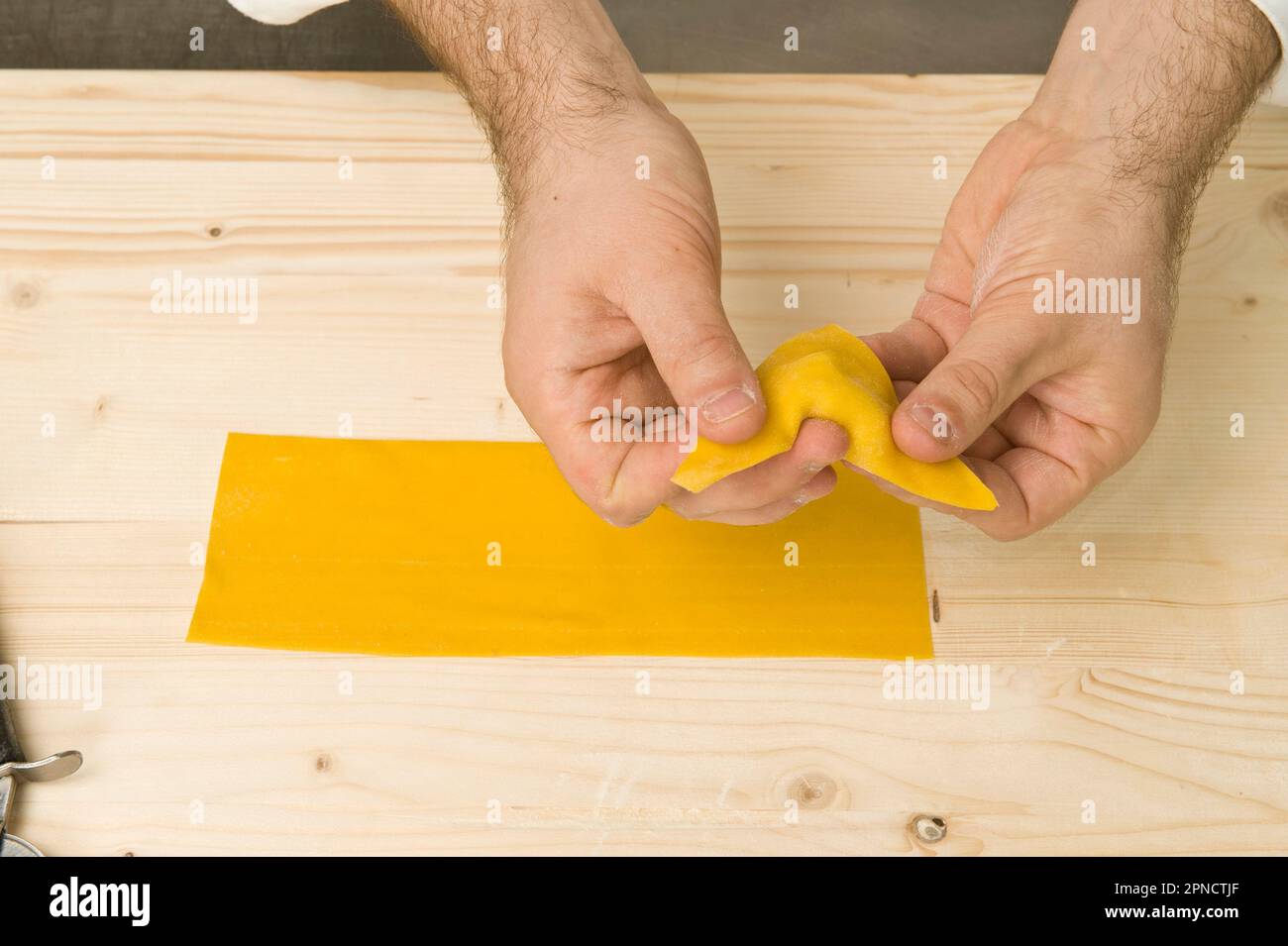 Making Tortelli from fresh pasta by hand. Italy Stock Photo - Alamy