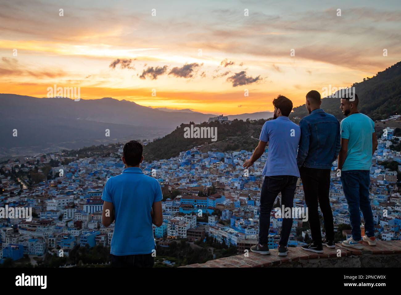 Chefchaouen, Morocco 2022: people wathching sunset on the hill ...