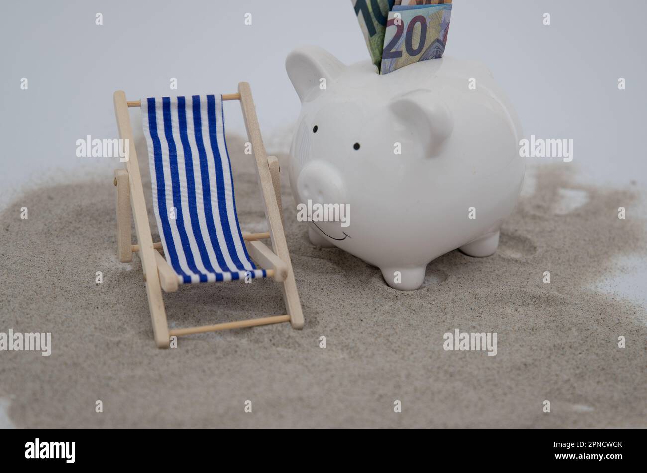 desk chair and piggy bank with banknotes as a concept for inflation and ...