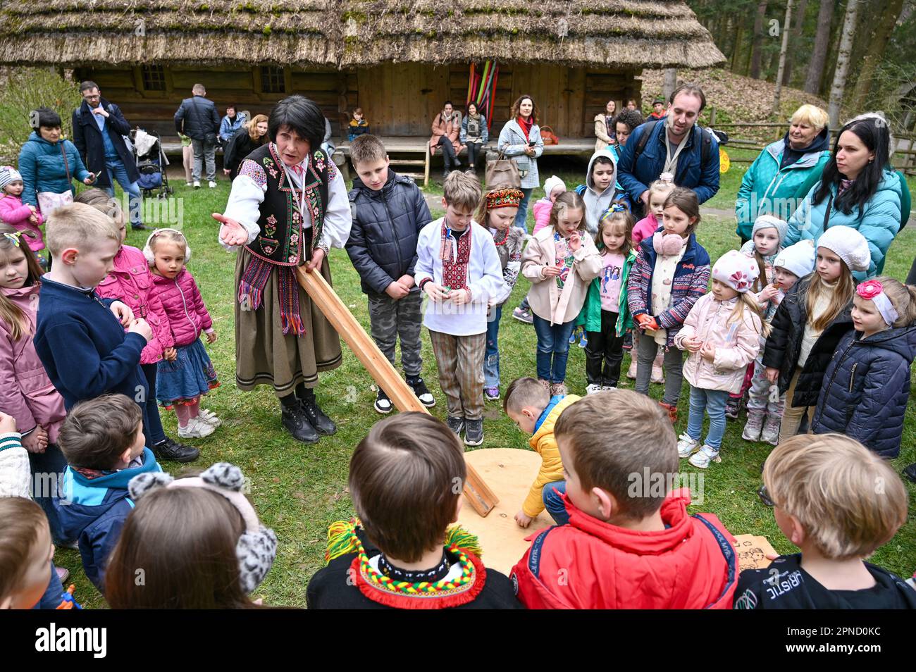 LVIV, UKRAINE - APRIL 16, 2023 - A woman speaks to children during the ...
