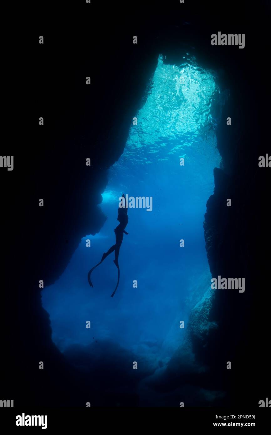 Woman diver in cave hi-res stock photography and images - Alamy