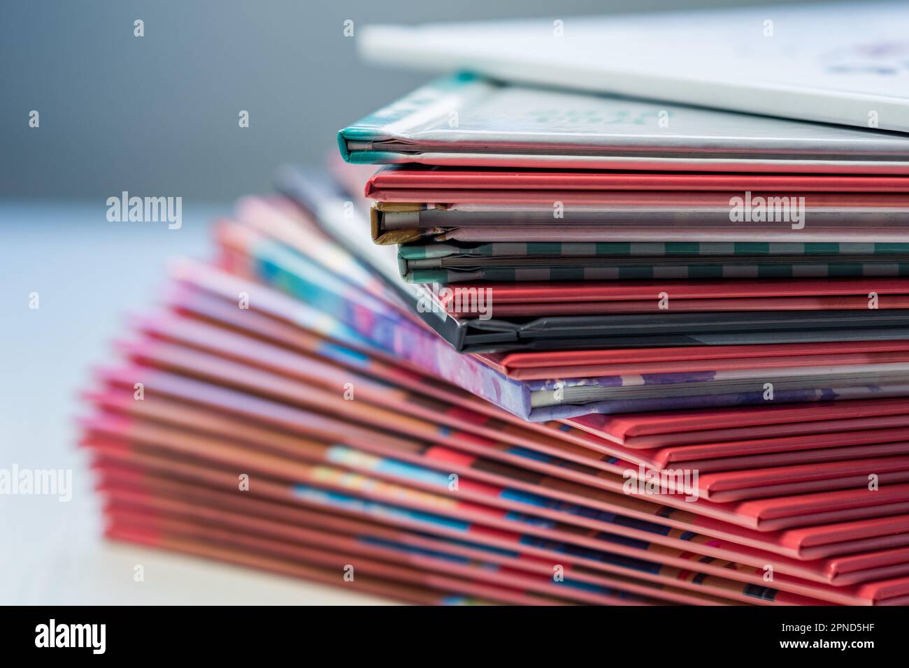 multi-colored spines of photo books close-up, partial blur Stock Photo ...