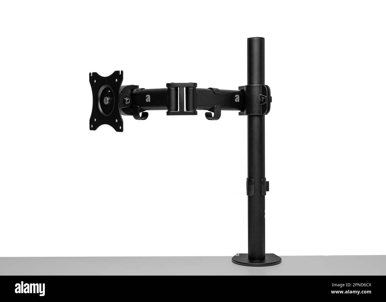 Desktop monitor mount isolated on white background Stock Photo - Alamy