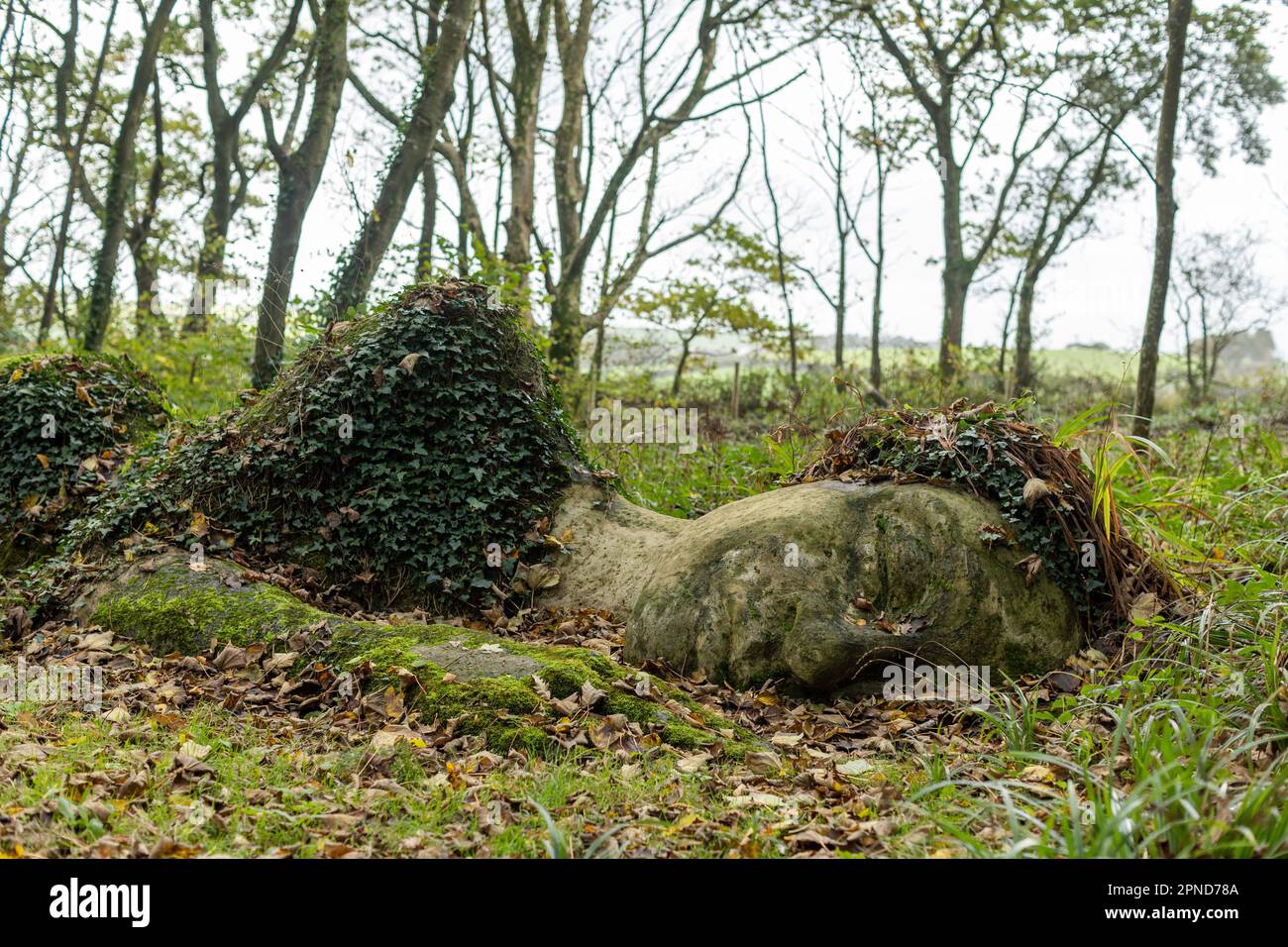 A stone statue, The Mudmaid, at The Lost Gardens of Helligan on the ...