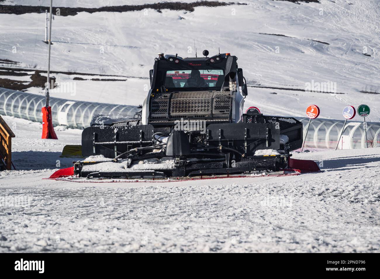 Huez, France - 9 April 2023: Snowcat, ratrack PistenBully - machine for ...
