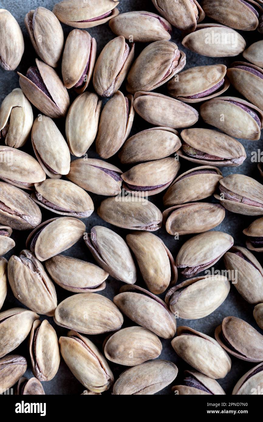 Pistachio texture and background. Delicious peanuts as background. Background made of salted ...