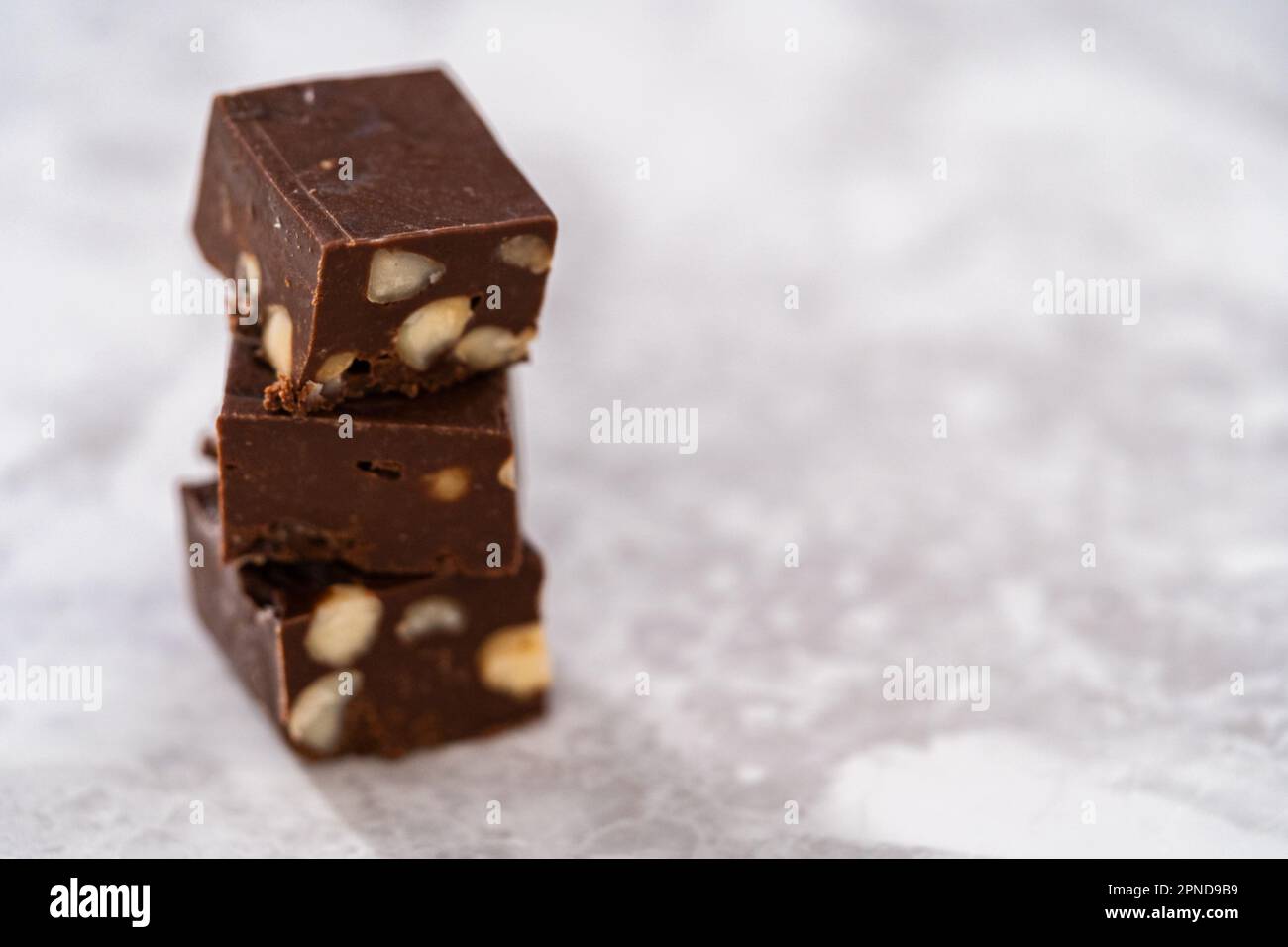Chocolate macadamia fudge Stock Photo - Alamy