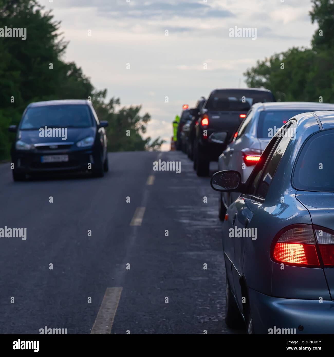traffic jams on the road are associated with the repair of the roadway ...
