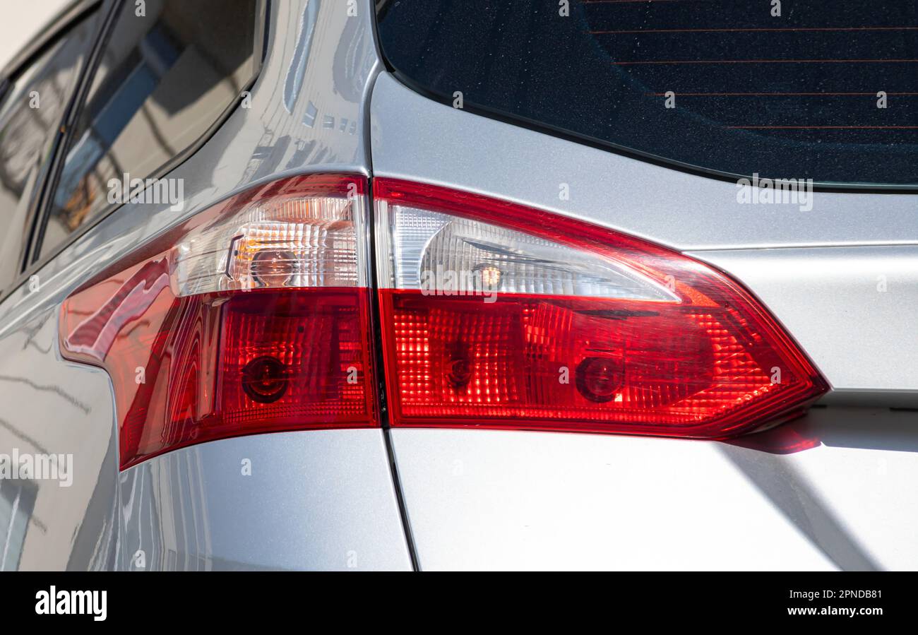 Car headlight, rear view. The back of the car and part of the way ...