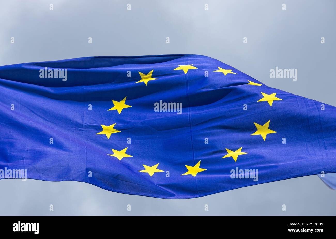 Official flag of the European Union in front of a blue sky Stock Photo ...