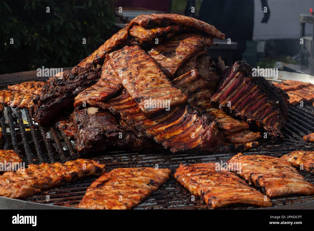 The pork ribs grilling with bbq glaze street food Stock Photo - Alamy