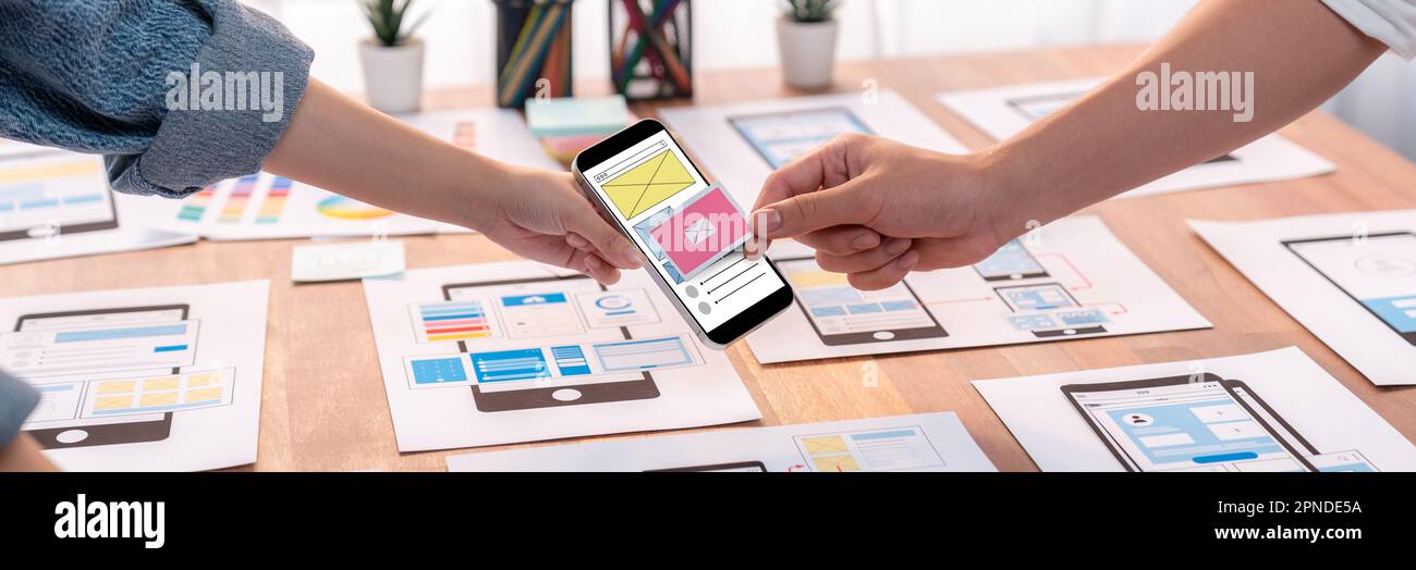 Panorama shot of front-end developer team brainstorming UI and UX ...