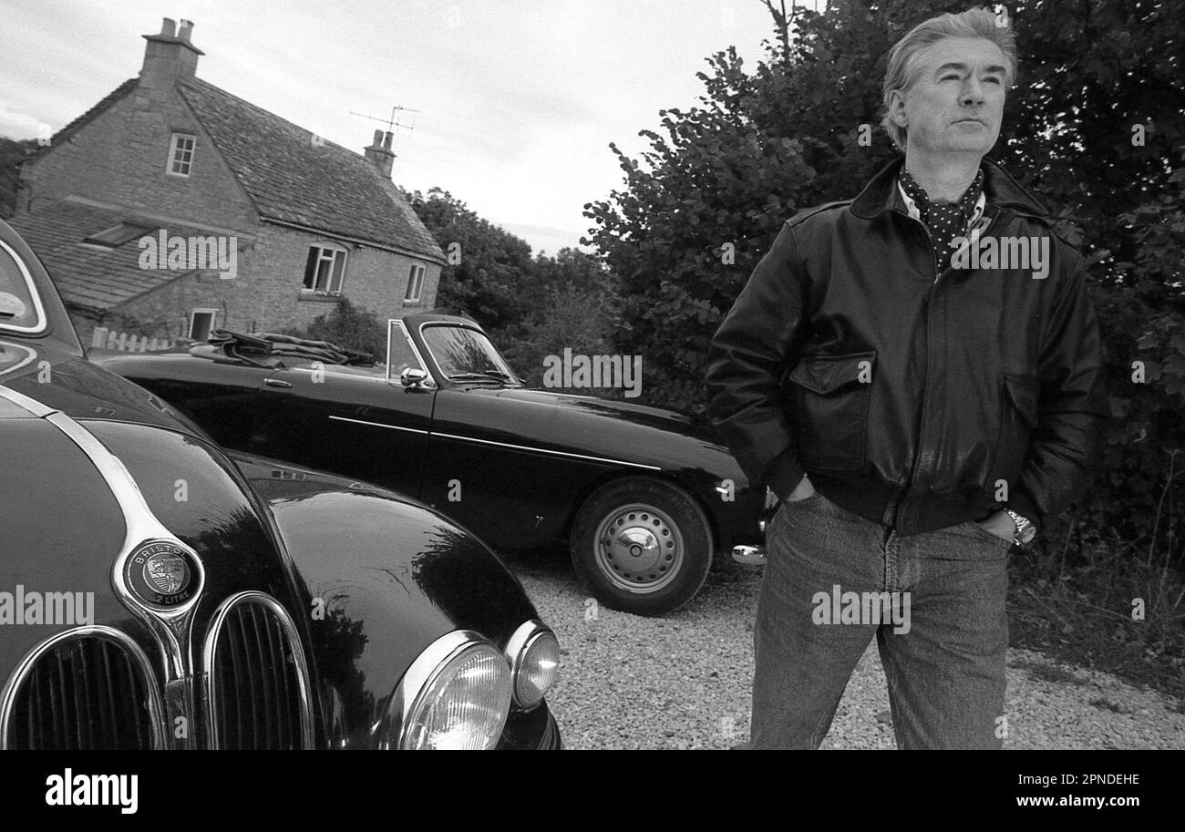 British composer Geoffrey Burgon with his Bristol 403 classic car Stock ...