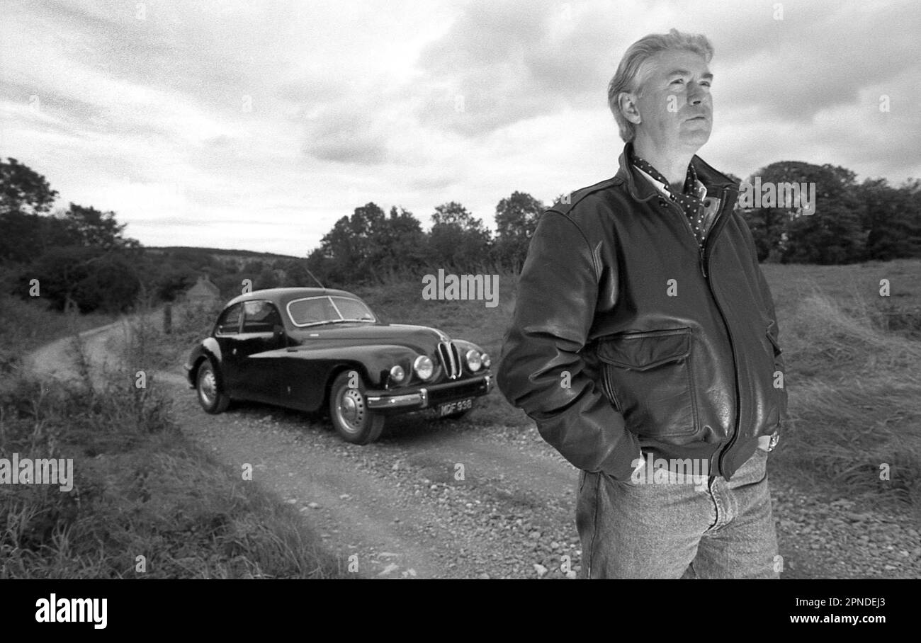British composer Geoffrey Burgon with his Bristol 403 classic car Stock ...