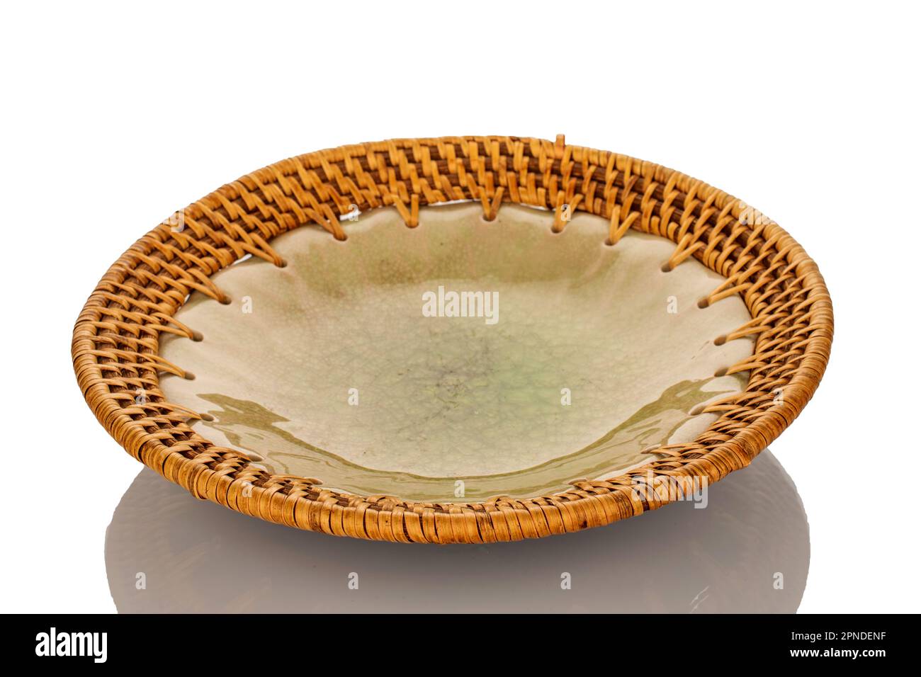 One clay plate, macro, isolated on white background Stock Photo - Alamy